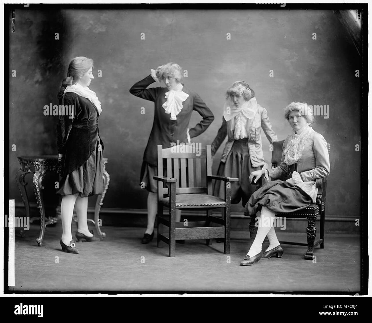 This dramatic group photograph captures a moment of high emotion and ...