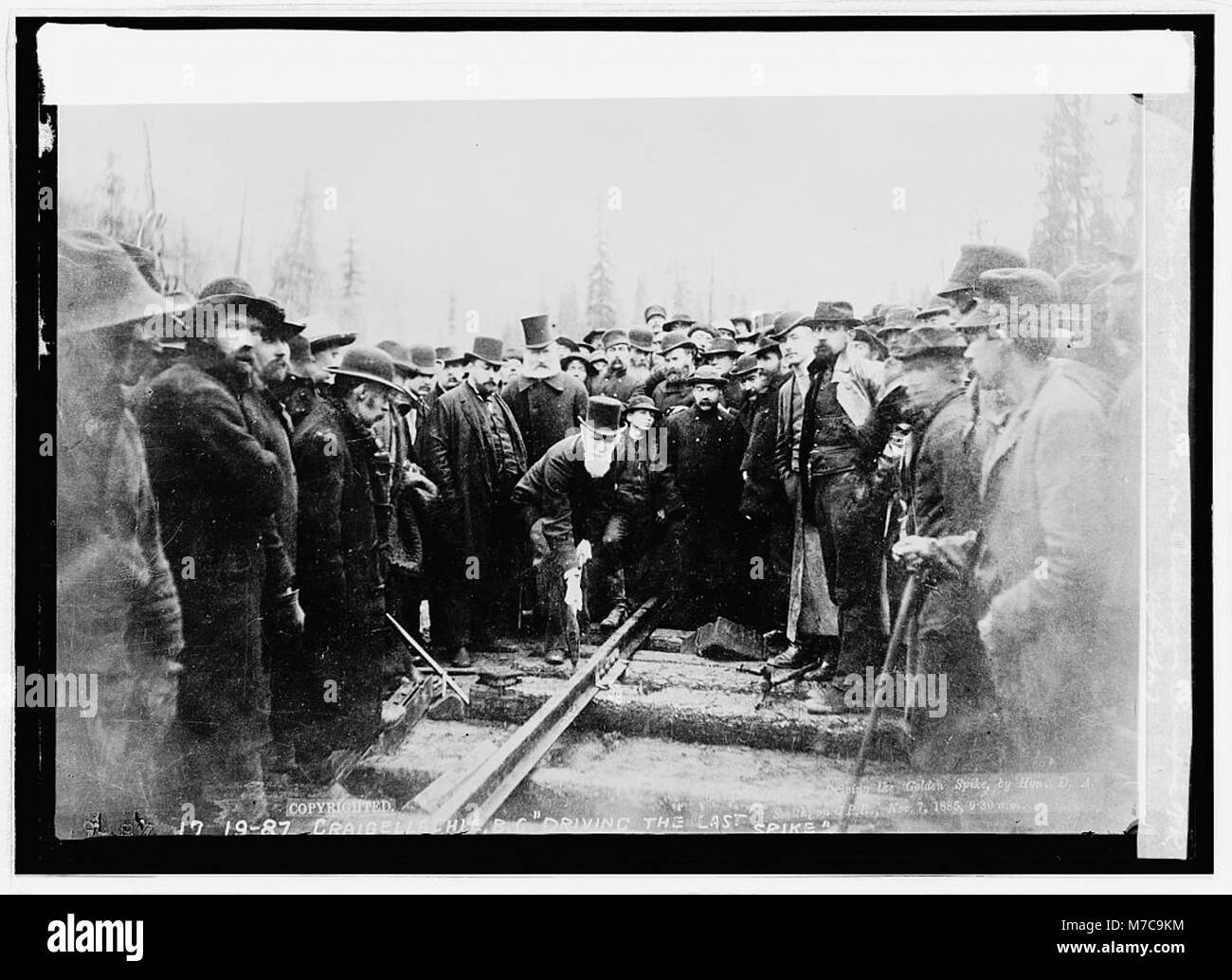 This image captures the ceremonial driving of the last spike on the ...