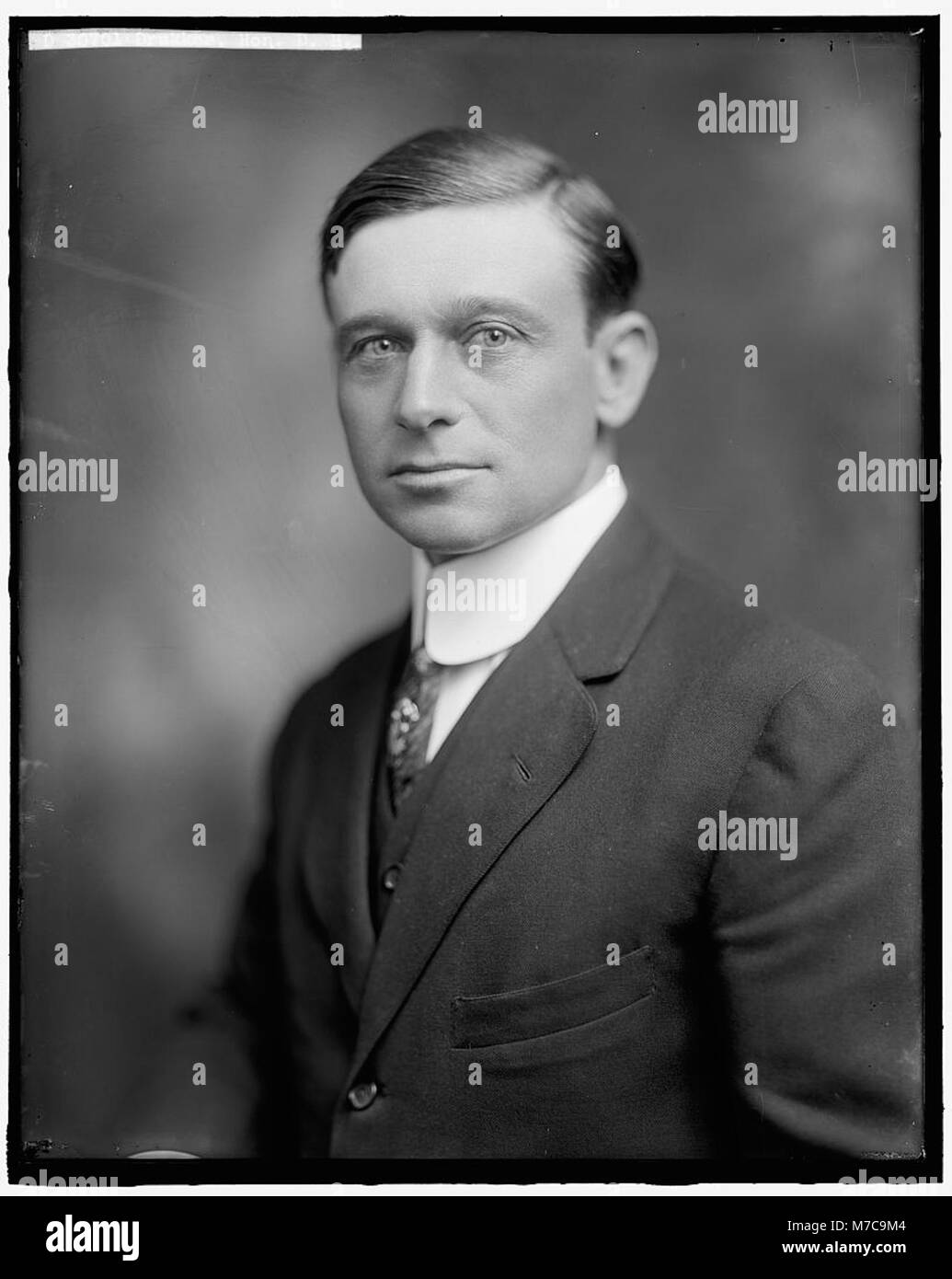 A portrait of Honorable D.H. Drukker, a figure of importance, captured ...