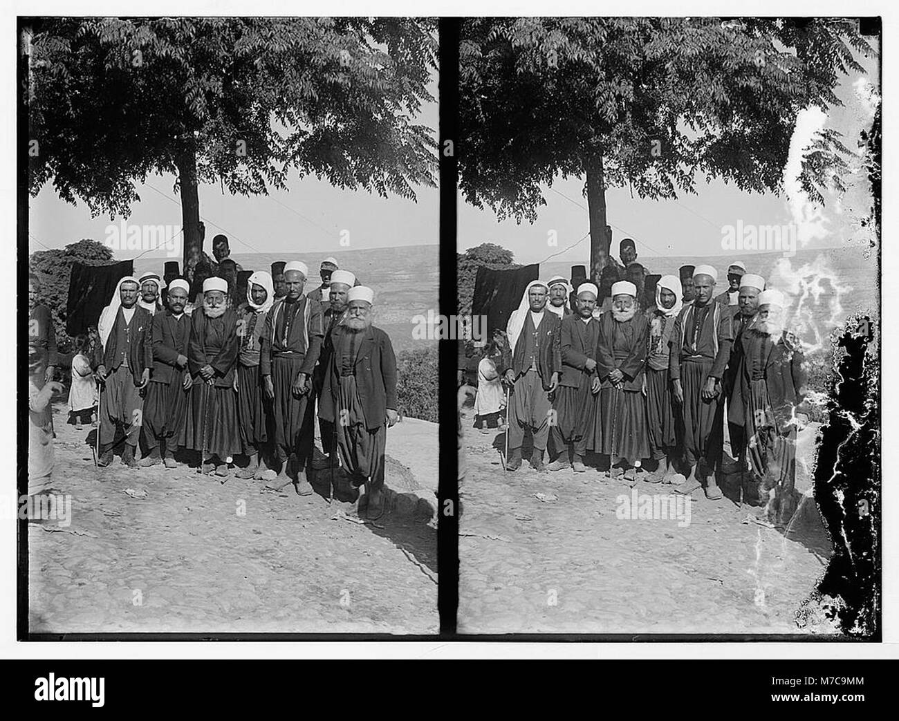 This photograph captures a group of Druse men, highlighting their ...