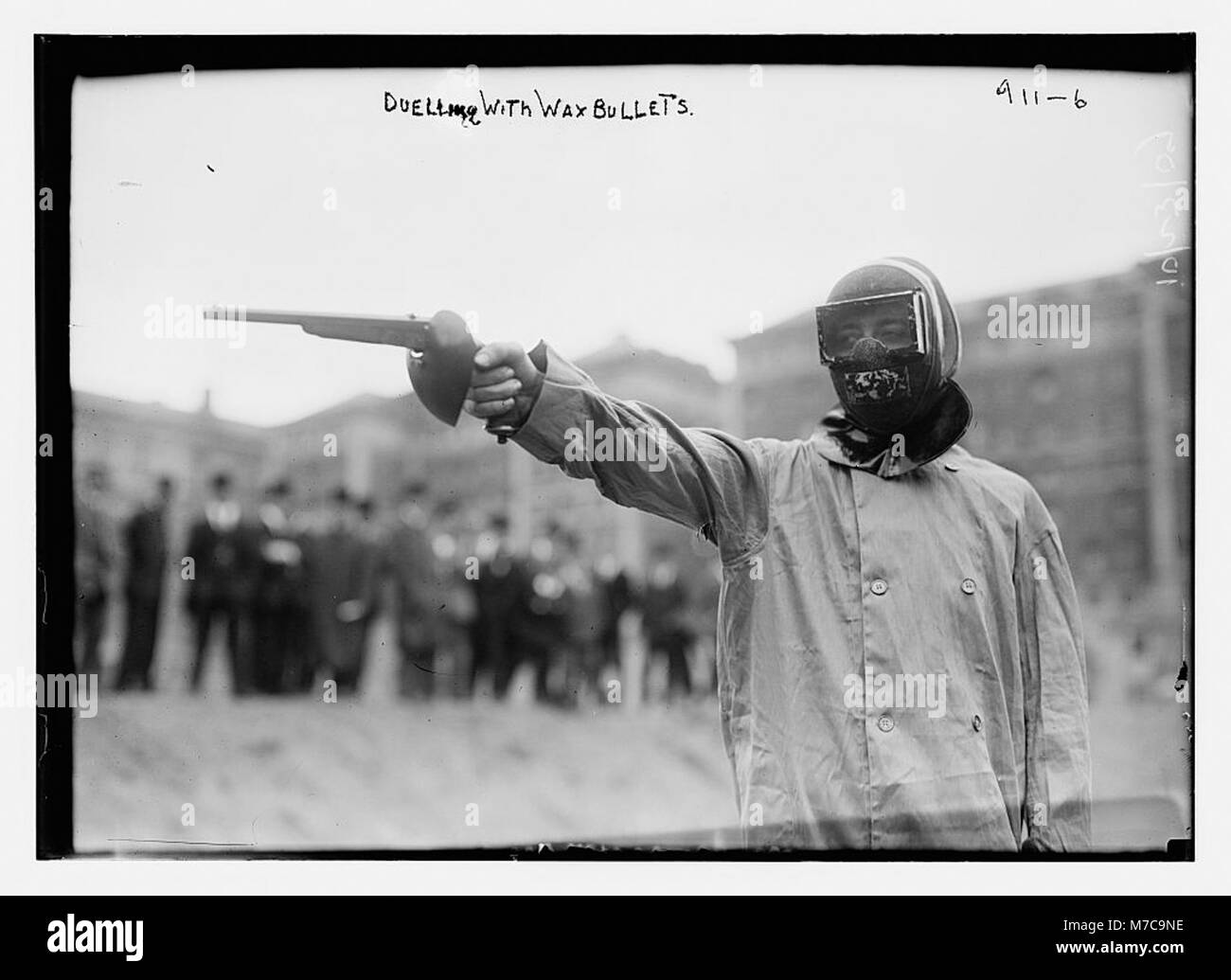 A photograph of a dueller in New York, pointing and using wax bullets ...
