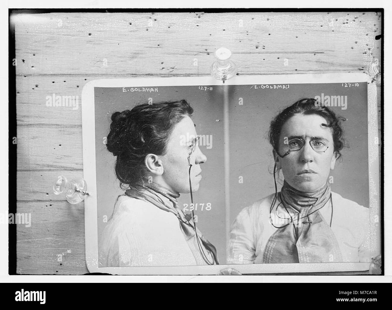 A set of two photographs of E. Goldman, displaying both a profile and ...
