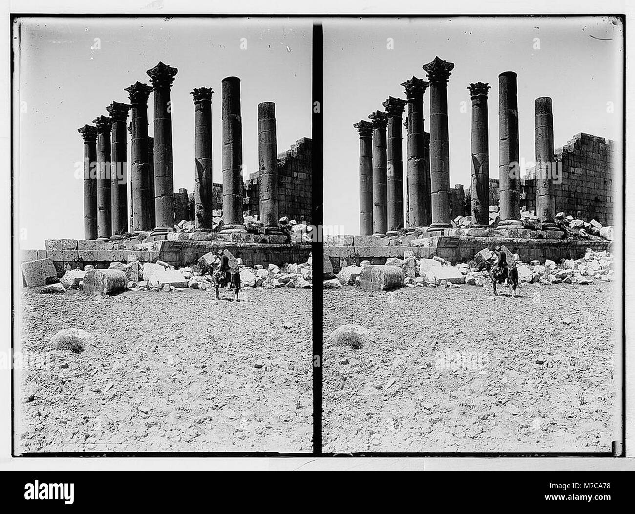 The photograph shows columns from the Temple of the Sun in Jerash ...