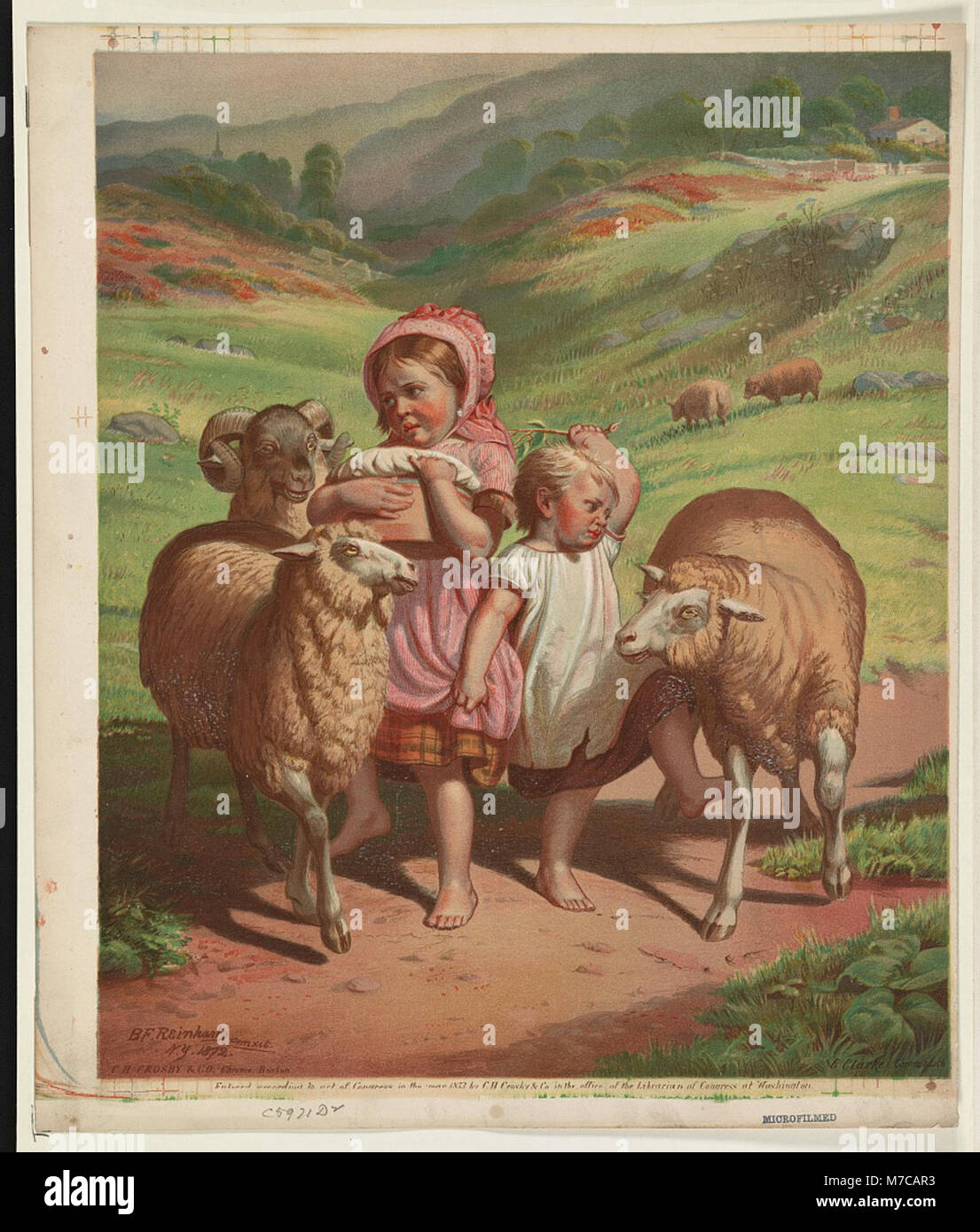 A photograph of two children interacting with two sheep and one ram ...