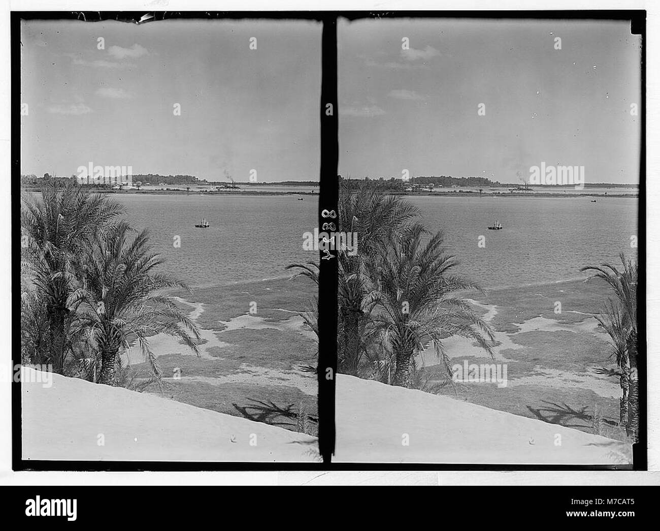 This photograph captures a view of the lake in Ismailia, Egypt, showing ...