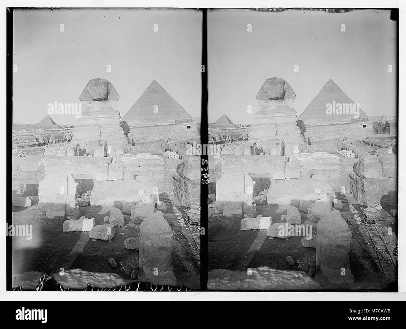 A photograph of the Sphinx and two pyramids in Egypt, with the Sphinx ...