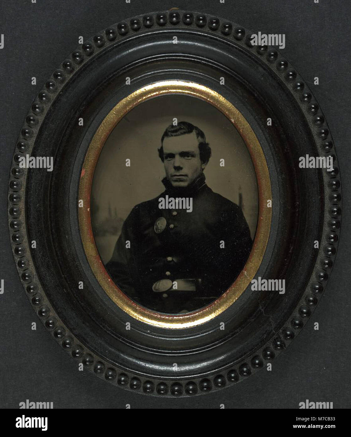 This photograph depicts Private Roscoe G. Davenport of Company H, 21st ...