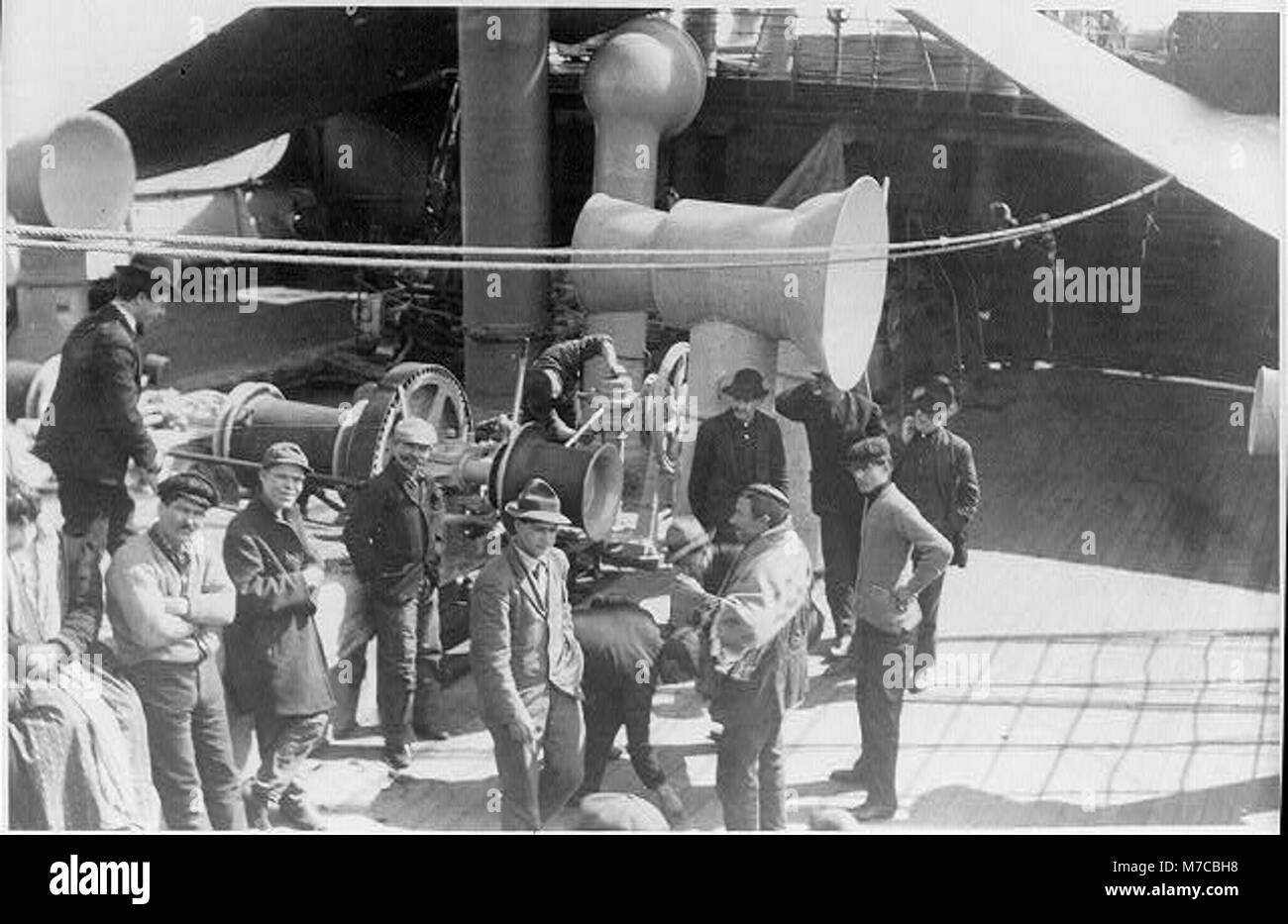 A historic photograph of emigrants aboard the steerage deck of the ship ...