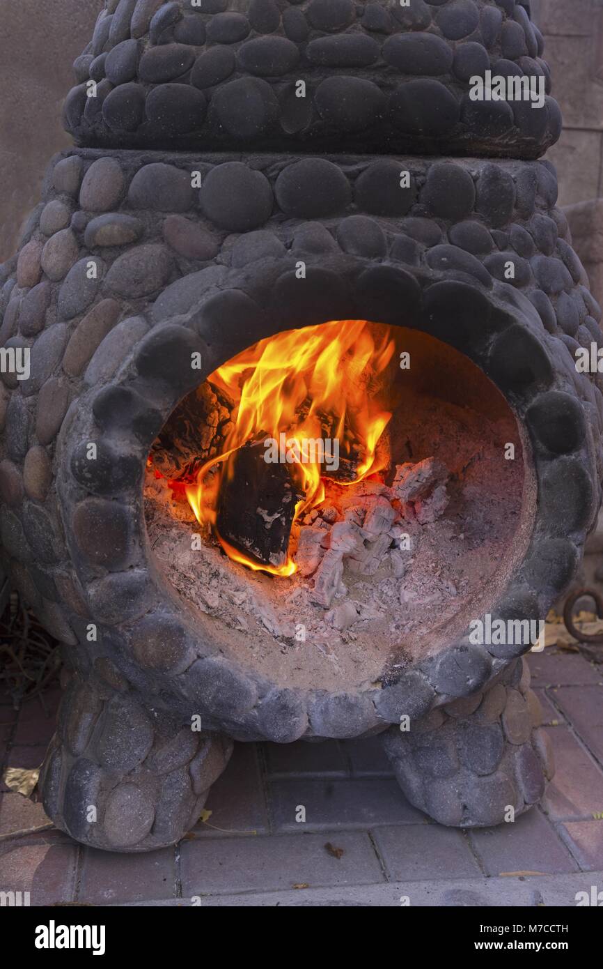 Vertical Portrait Cut Out Fire Burning in Old Charcoal Stone Fireplace ...