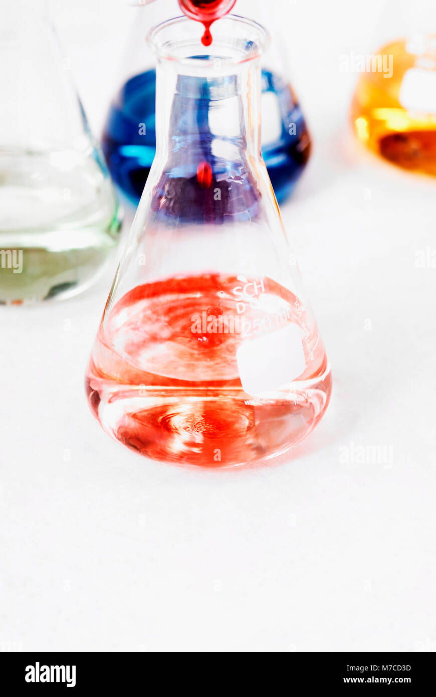 Four different colored liquids in conical flasks hi-res stock ... Four different colored liquids in conical flasks hi-res stock ...