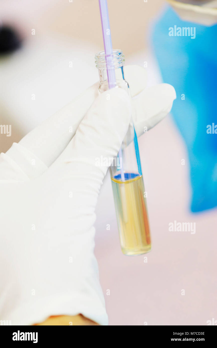 Close up of a pipette in a persons hand hi-res stock photography and ...