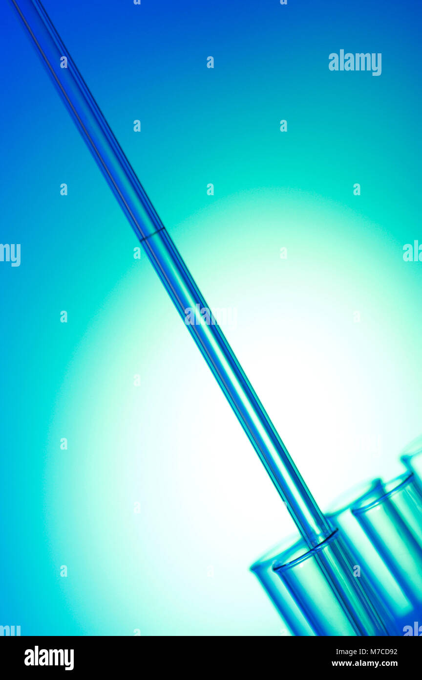 Close-up of a dropper over test tubes Stock Photo - Alamy