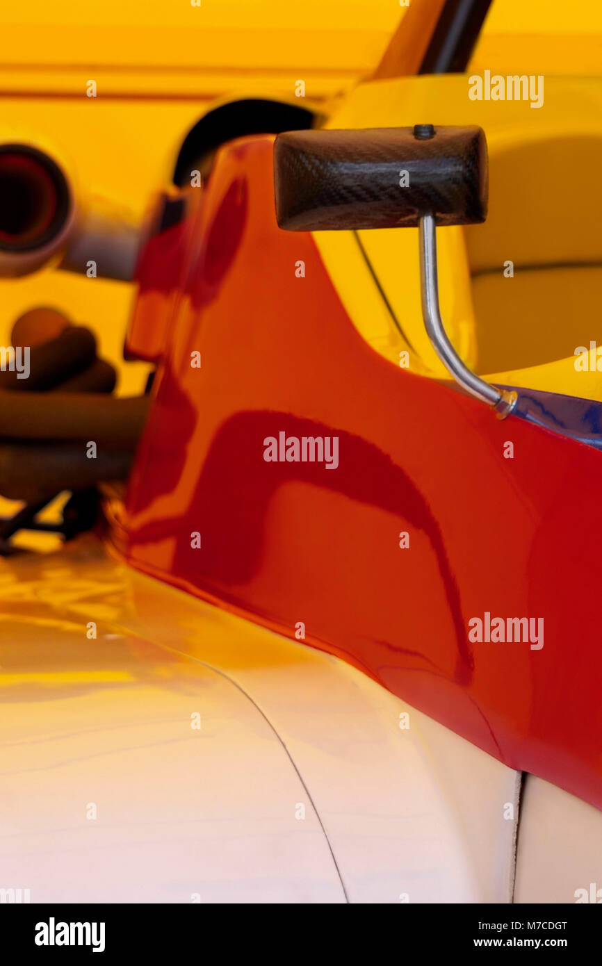 Close-up of the side view mirror of a racecar Stock Photo - Alamy