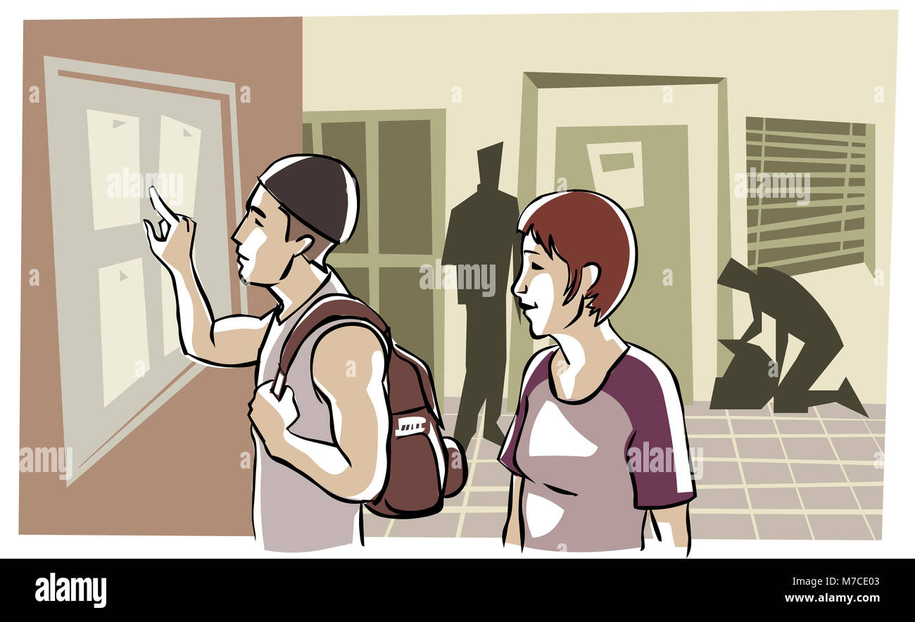 Boy and a girl looking at an information board Stock Photo - Alamy