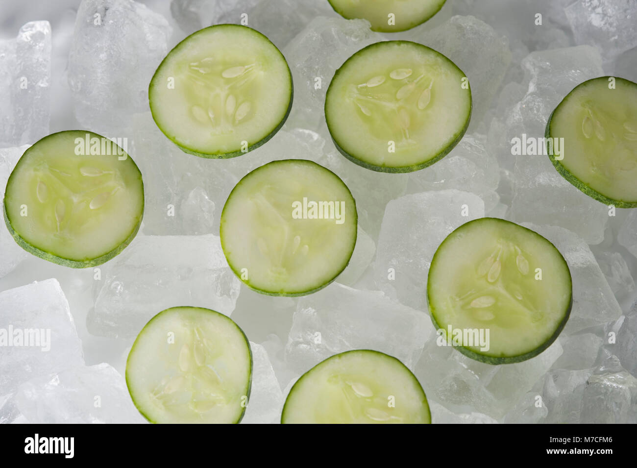 Close-up of cucumber slices on ice cubes Stock Photo - Alamy
