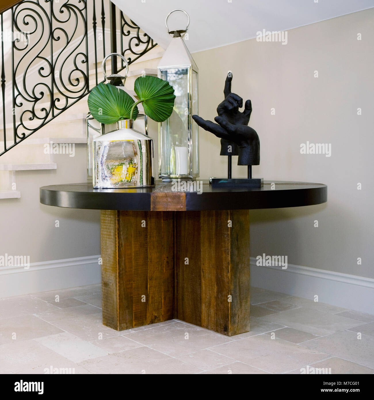 Show pieces on a table under a staircase hi-res stock photography and ...
