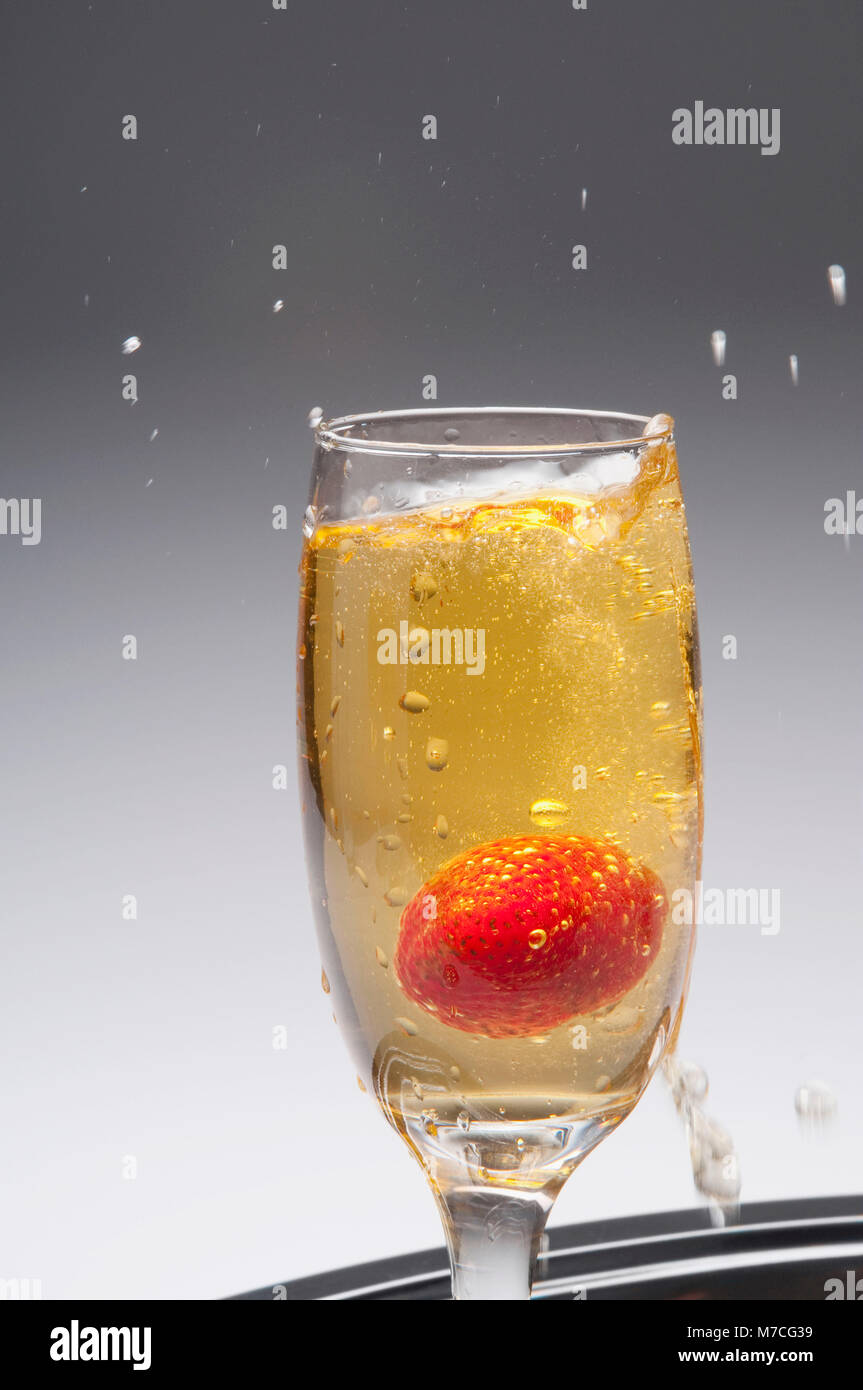 Close-up of a strawberry in a champagne flute Stock Photo - Alamy