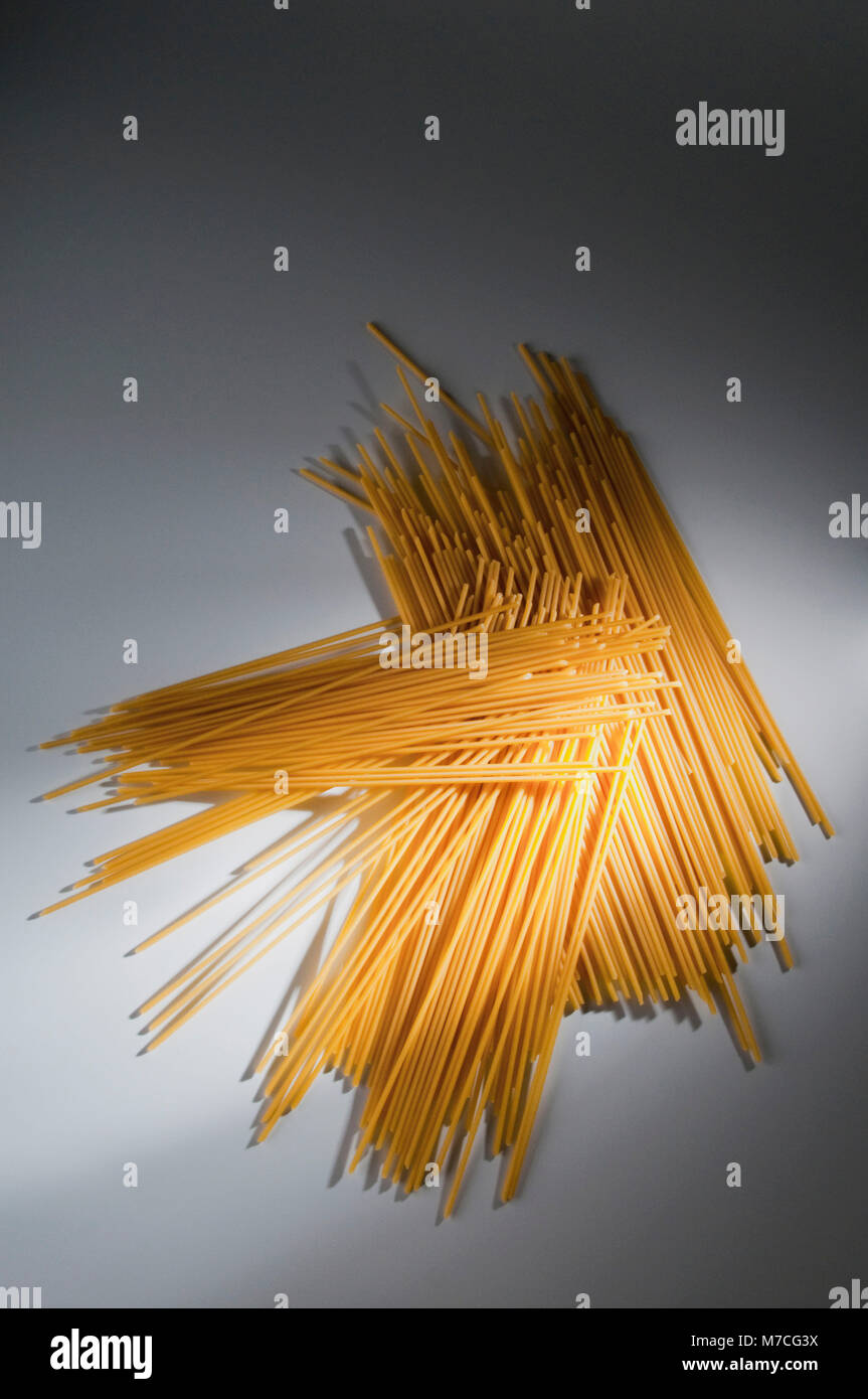 High angle view of uncooked spaghetti Stock Photo - Alamy