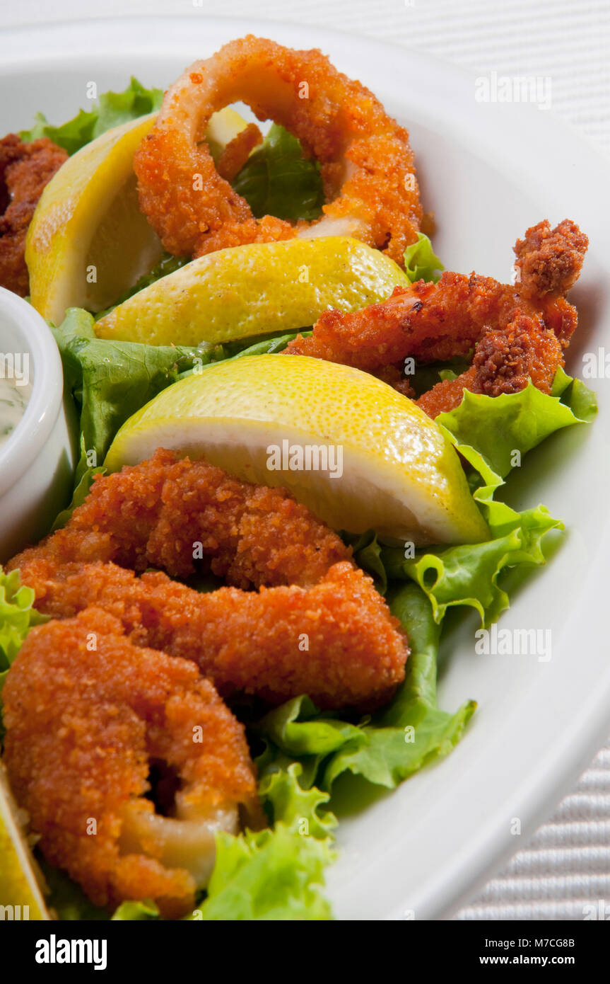 Close-up of crumb fried squid rings Stock Photo - Alamy