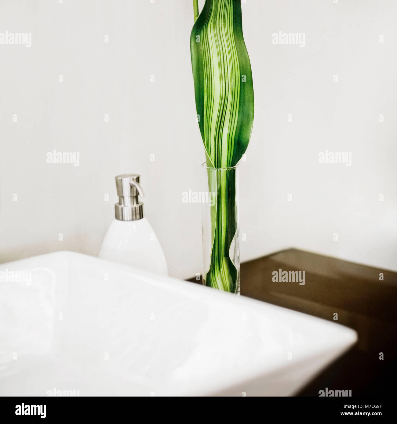 Vase with a wash bowl in the bathroom Stock Photo - Alamy