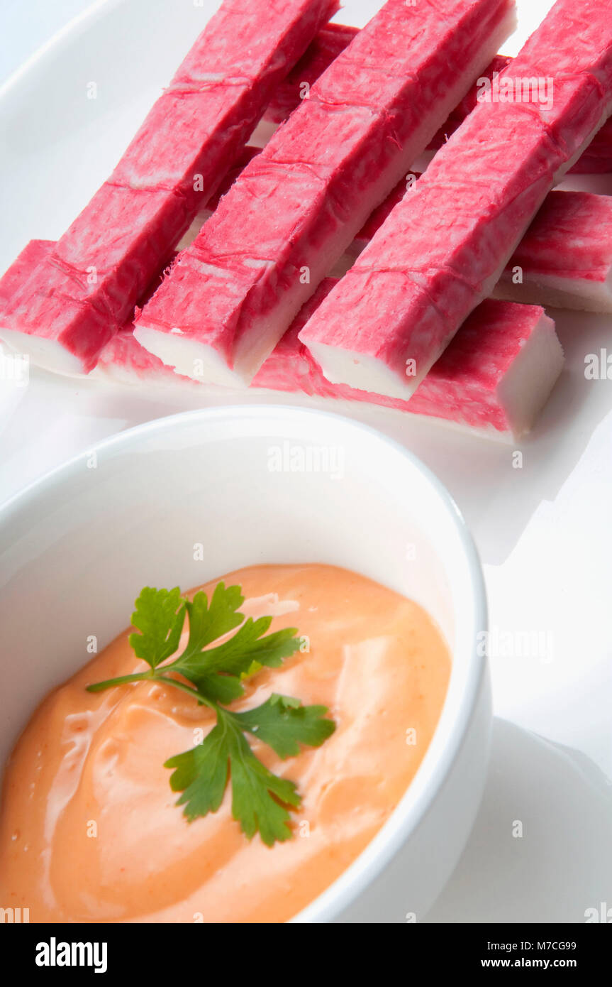 High angle view of octopus fingers with dip Stock Photo - Alamy