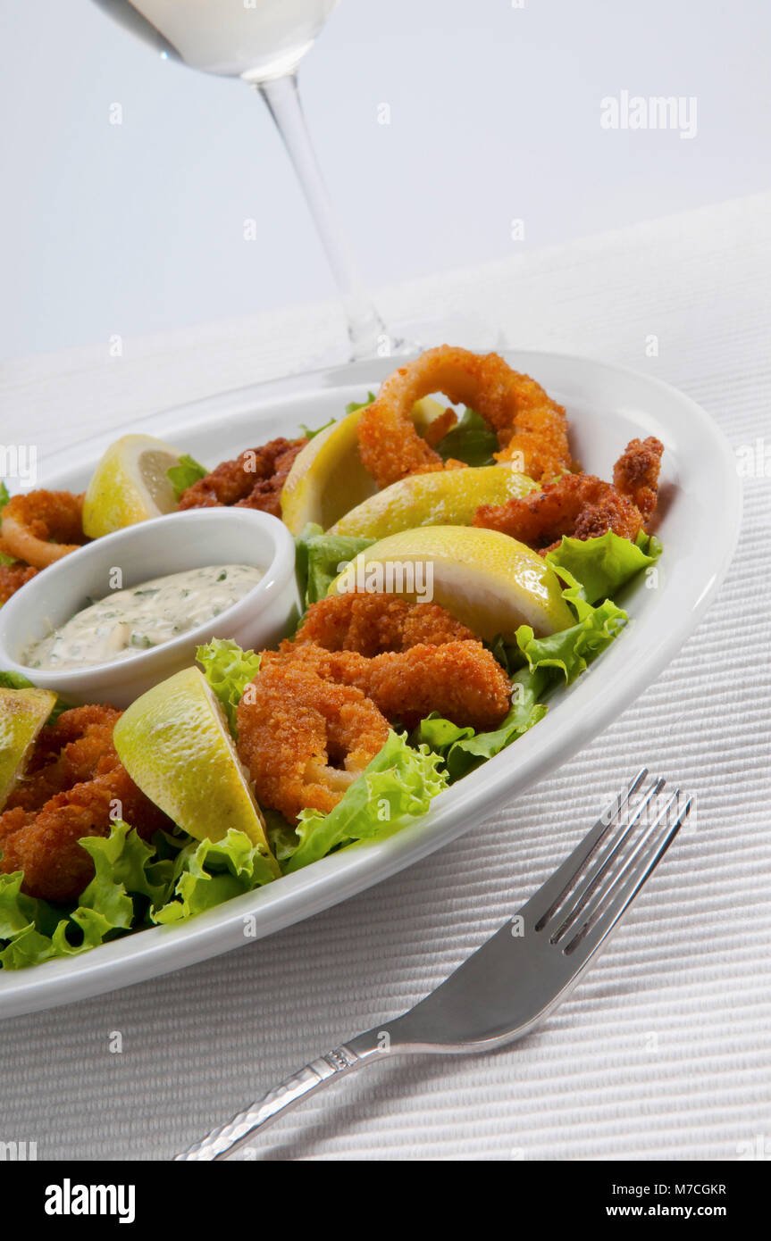 Close-up of crumb fried squid rings Stock Photo - Alamy