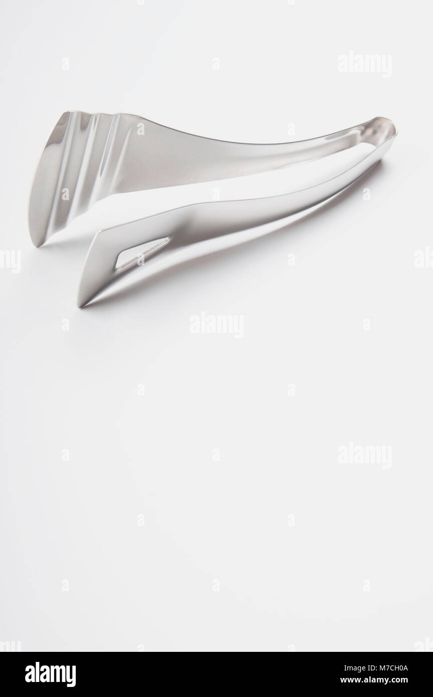 Close-up of a metal tongs Stock Photo - Alamy