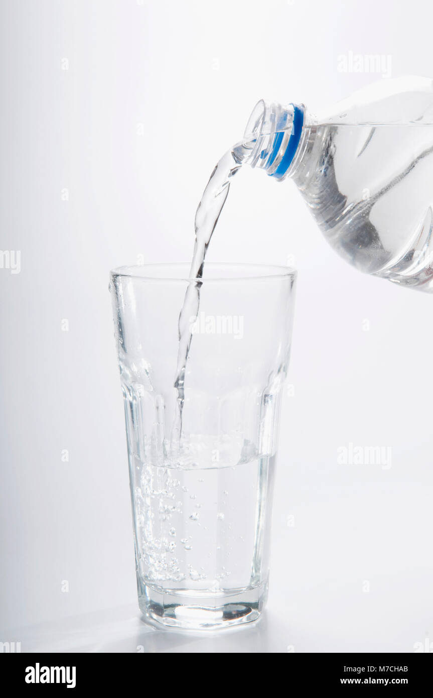 Liquid Pouring From Bottle Stock Photos & Liquid Pouring From Bottle ...
