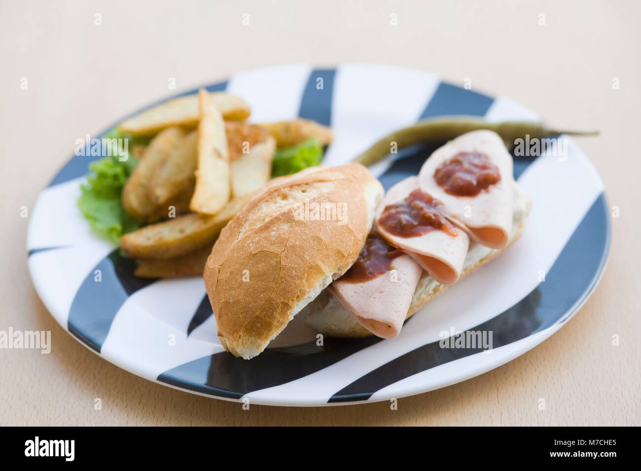 High angle view of a salami and salsa sandwich Stock Photo - Alamy