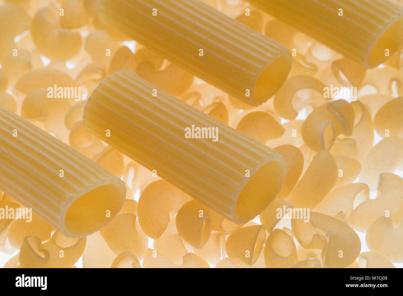 Close-up of raw macaroni and rigatoni Stock Photo - Alamy