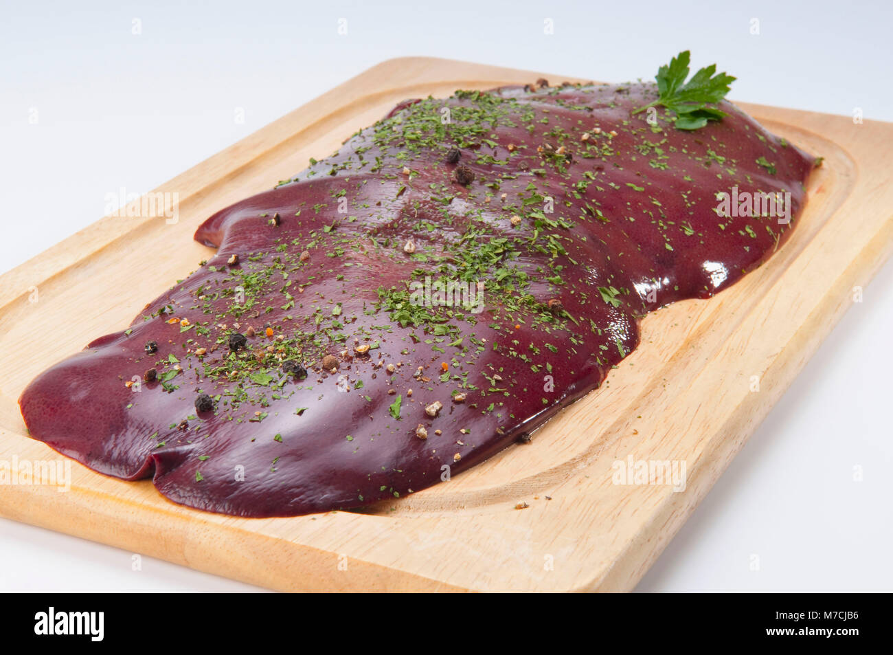Close-up of beef kidneys on a cutting board Stock Photo - Alamy