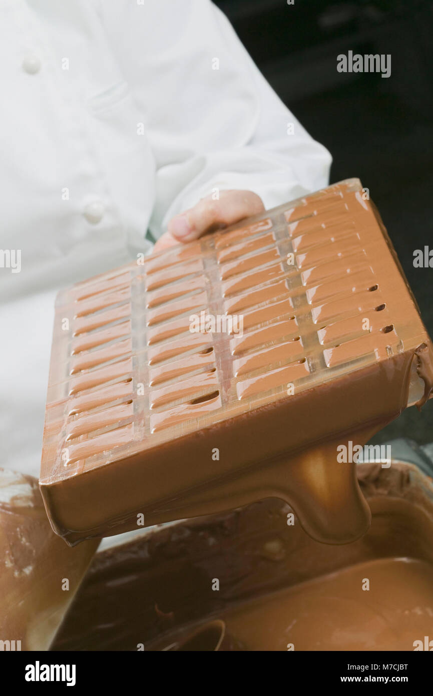 Male chef holding mold hi-res stock photography and images - Alamy