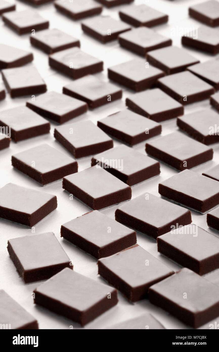 Close-up of square shape pieces of chocolate Stock Photo - Alamy