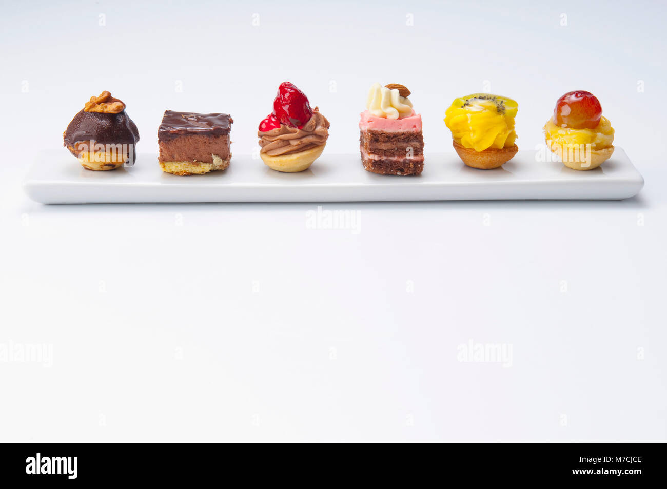 Close-up of a platter of assorted tarts and pastries Stock Photo - Alamy