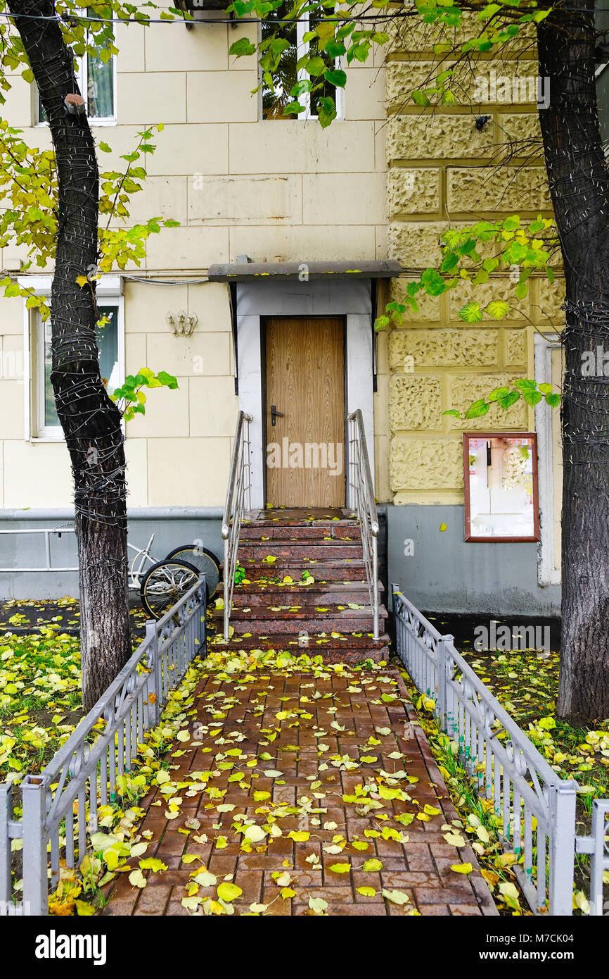 Autumn leaves with the house at downtown in Moscow, Russia Stock Photo ...