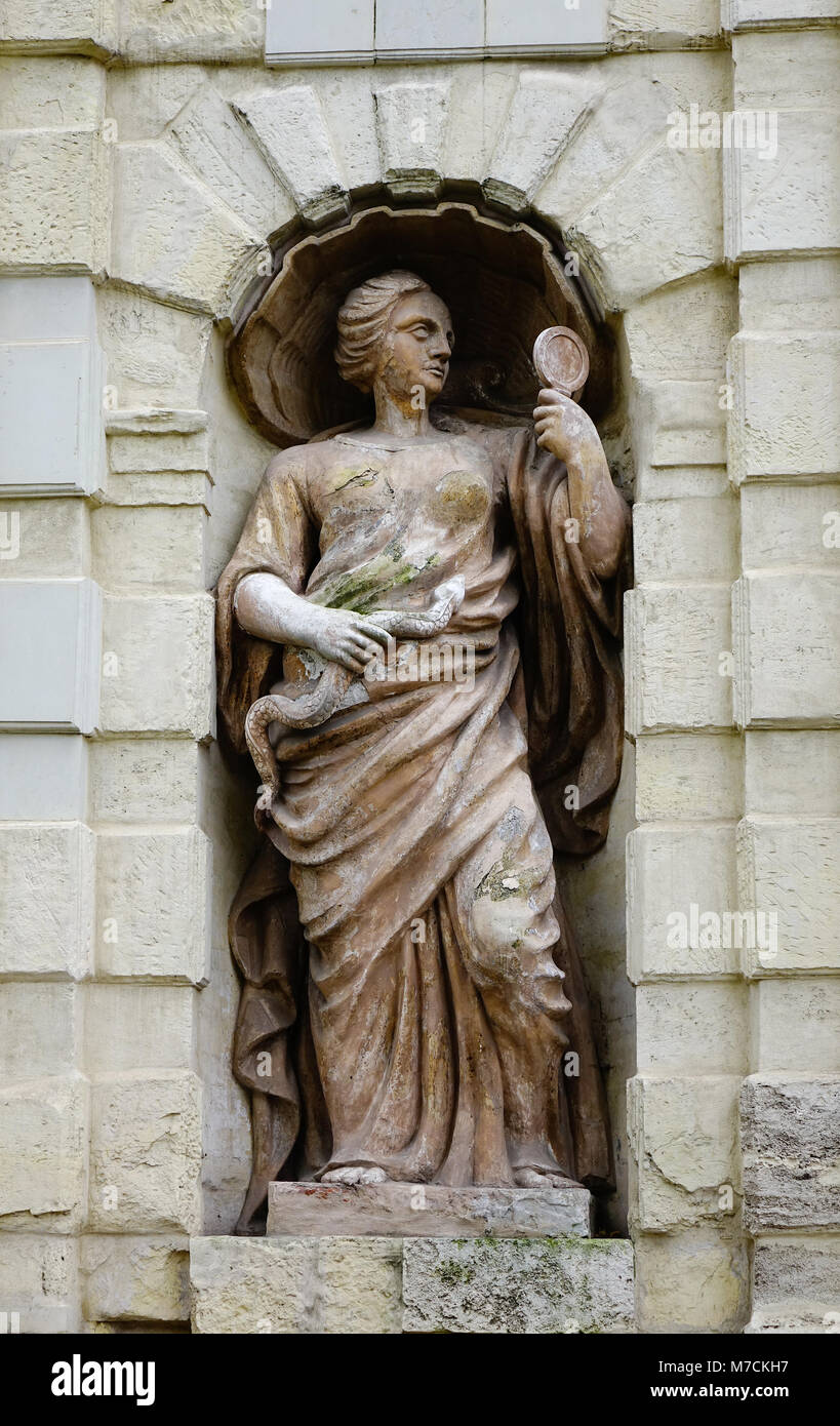 Lady God statue on the stone wall at ancient castle in Saint Petersburg ...