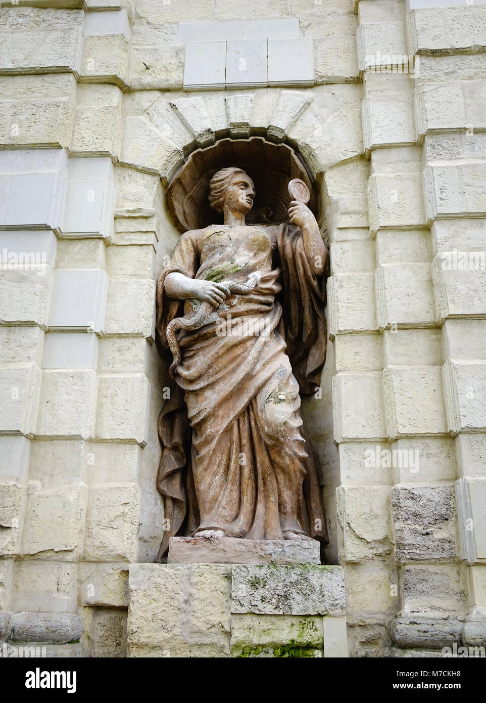 Lady God statue on the stone wall at ancient castle in Saint Petersburg ...