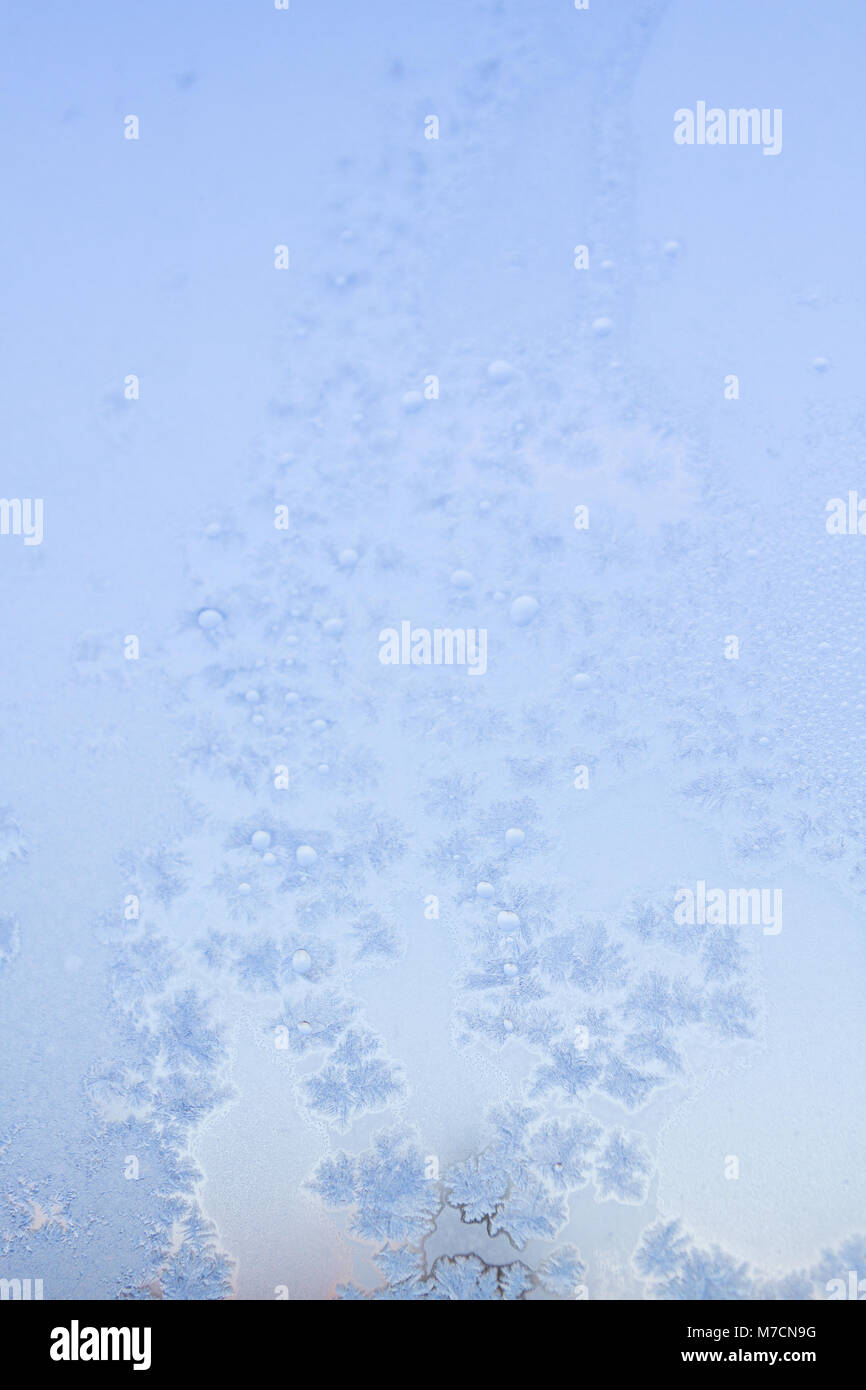 Winter frosty patterns on the frozen ice window Stock Photo - Alamy