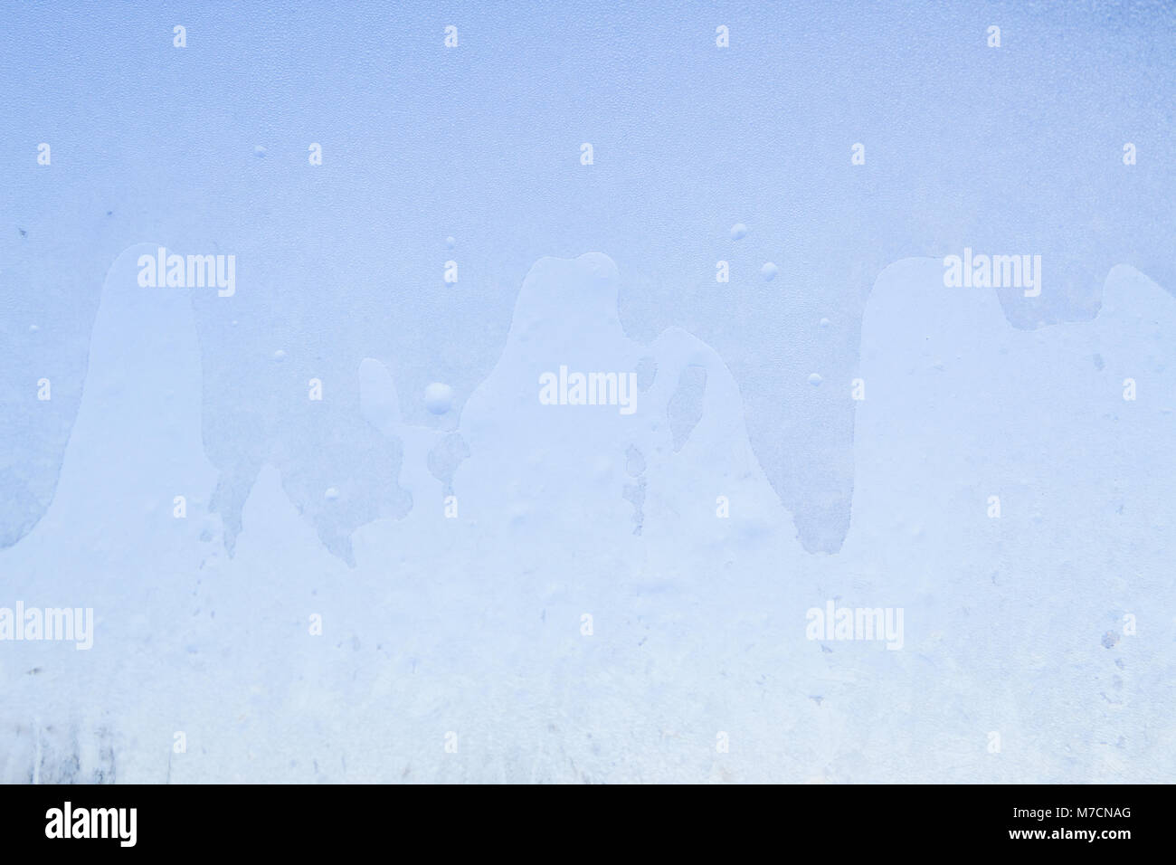 Winter frosty patterns on the frozen ice window Stock Photo - Alamy