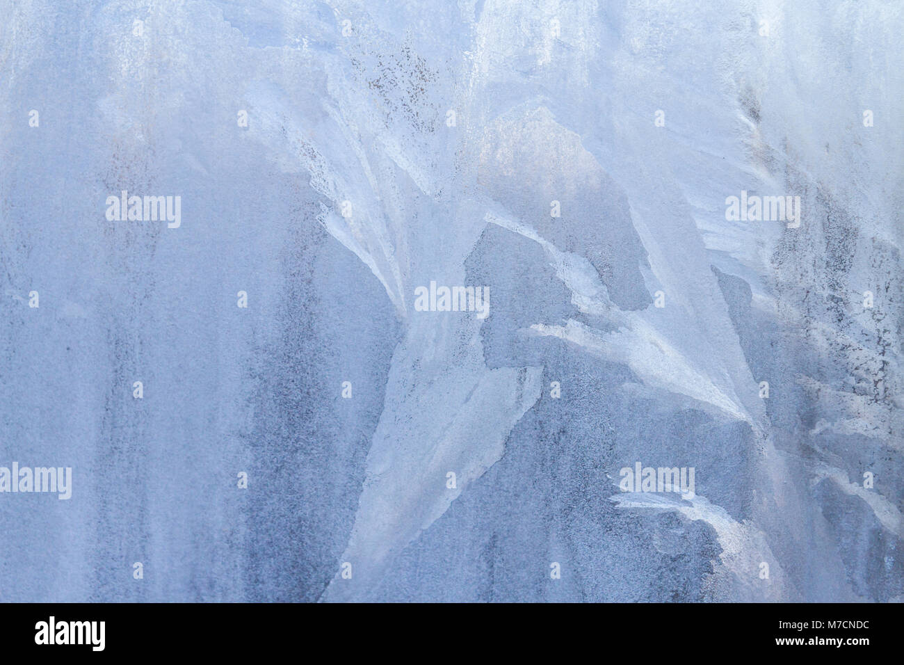 Winter frosty patterns on the frozen ice window Stock Photo - Alamy