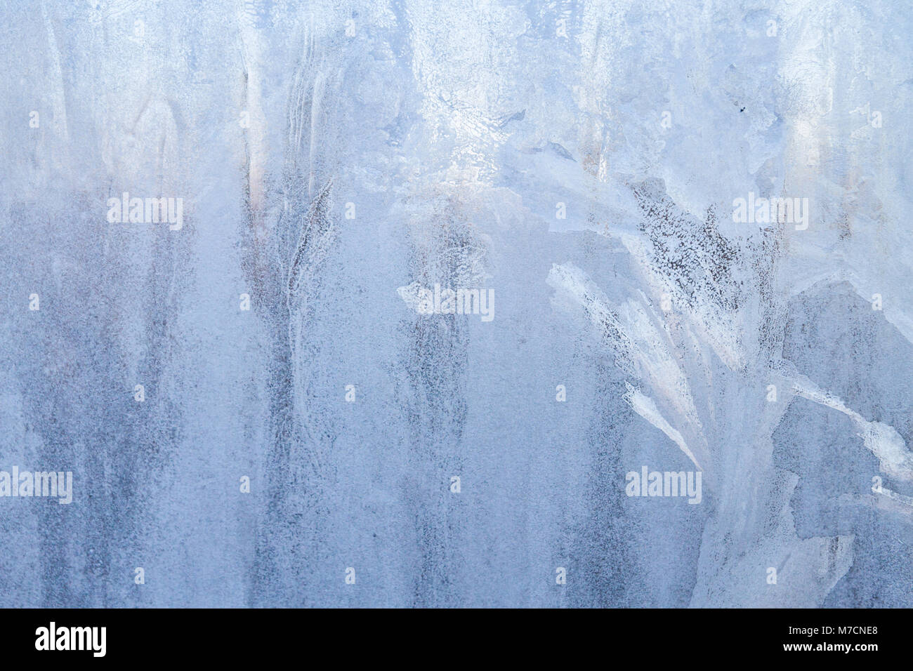 Winter frosty patterns on the frozen ice window Stock Photo - Alamy