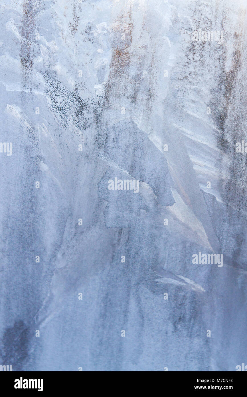 Winter frosty patterns on the frozen ice window Stock Photo - Alamy