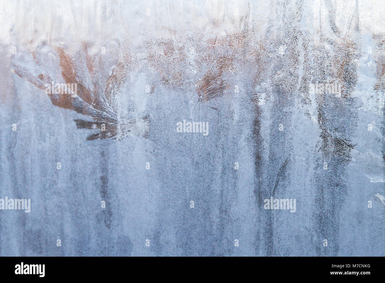 Winter frosty patterns on the frozen ice window Stock Photo - Alamy