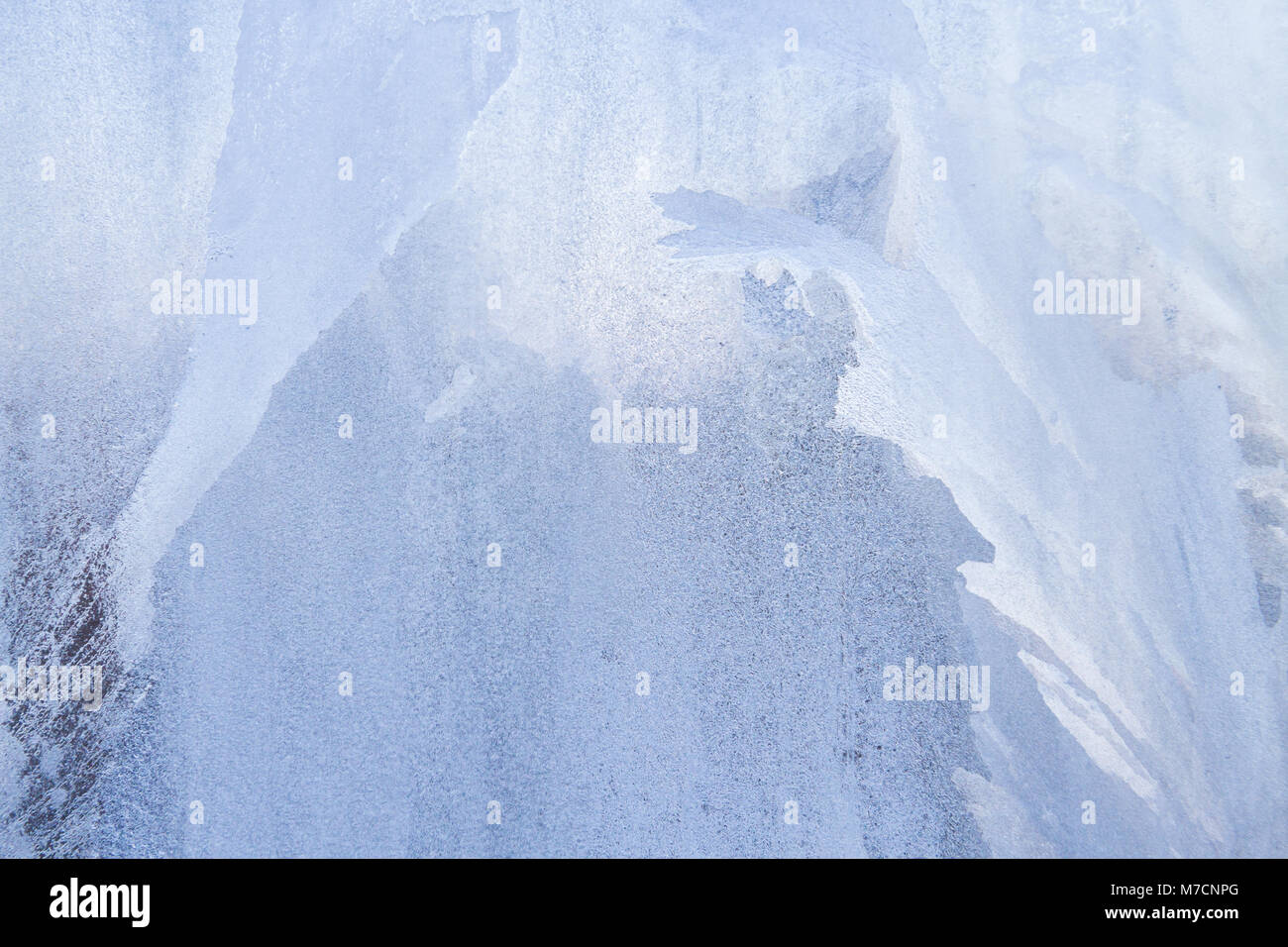Winter frosty patterns on the frozen ice window Stock Photo - Alamy