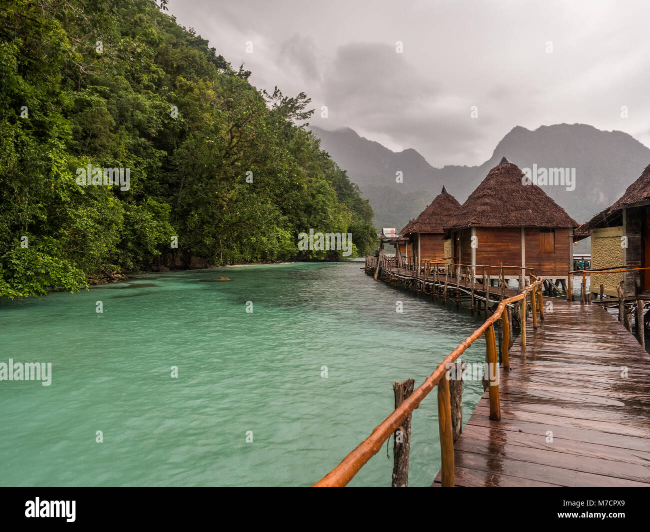 Ora Beach, Indonesia - February 14, 2018: Houses on the water in Ora ...