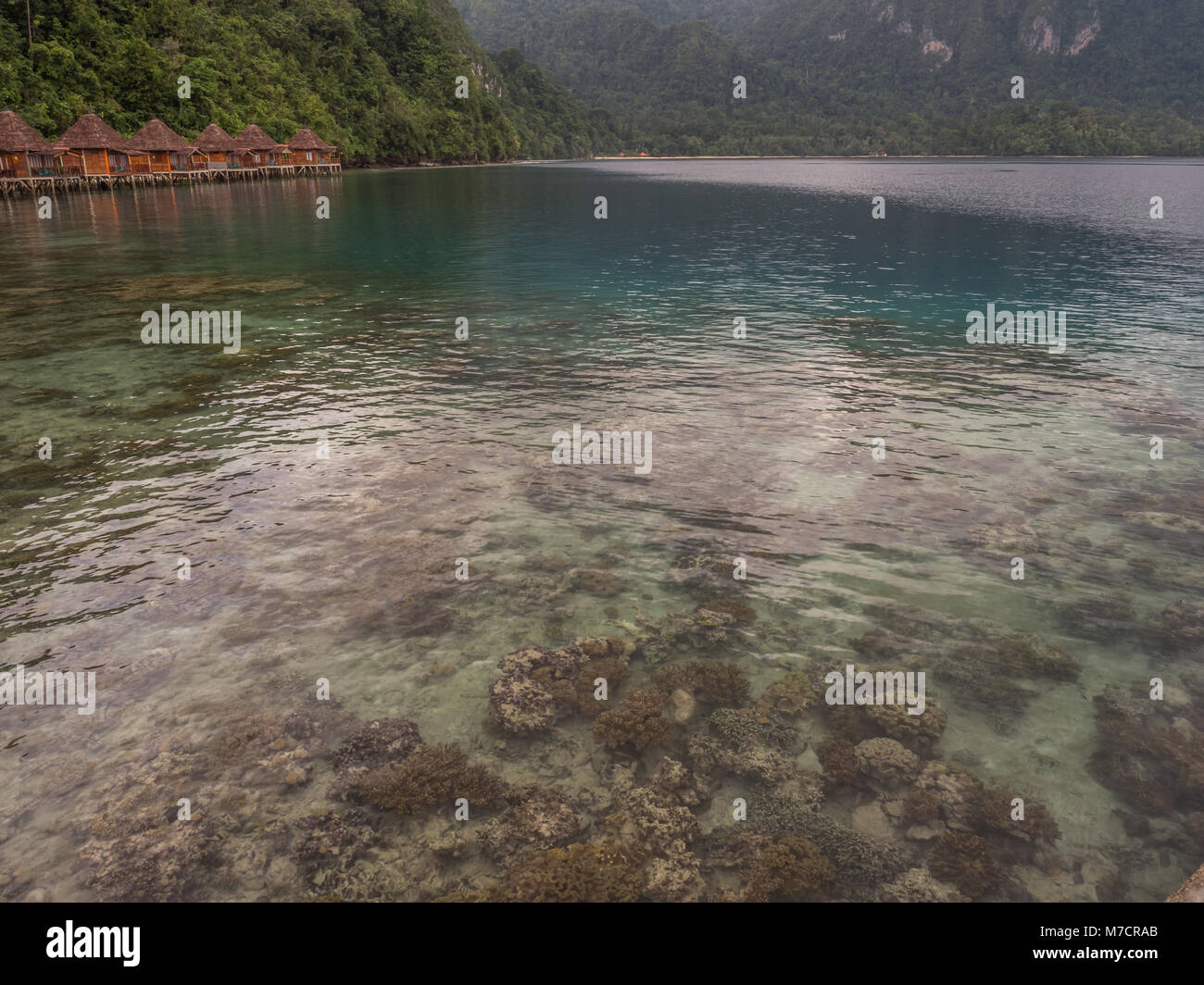 Ora Beach, Indonesia - February 14, 2018: Houses on the water in Ora ...