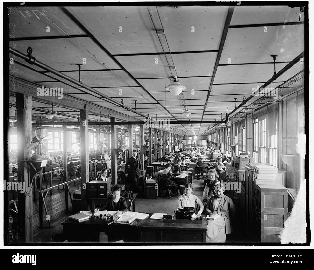 A photograph showing enlisted officers in a military setting, focusing ...