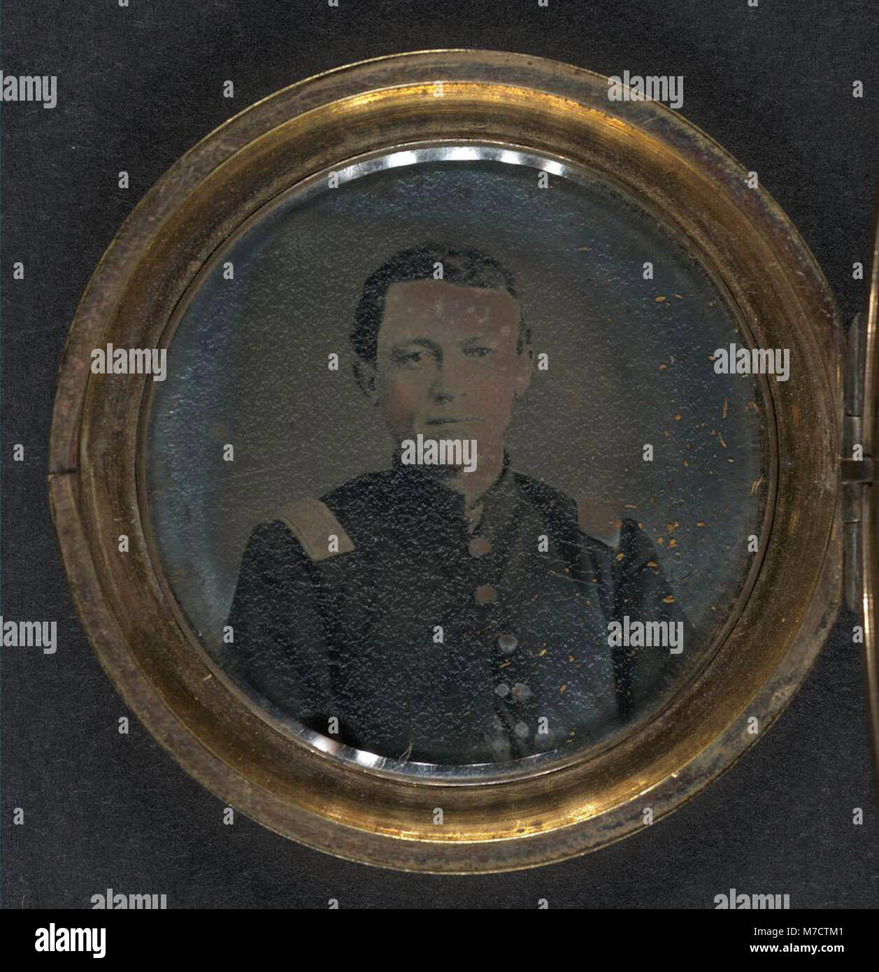 This photograph shows an unidentified Union soldier in uniform, paired ...