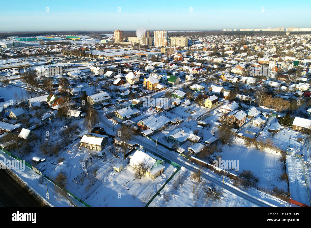 Aerial view of Podolsk cityscape abd real esate on winter sunny morning ...