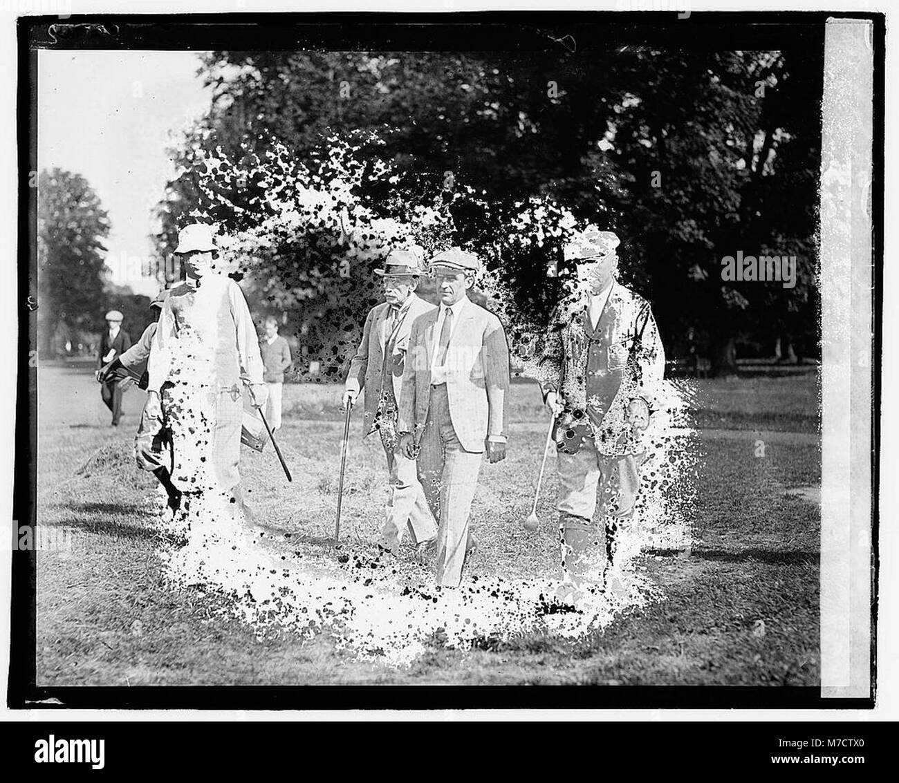 A photograph of four individuals named Evans, Lathrop, Grayson, and ...